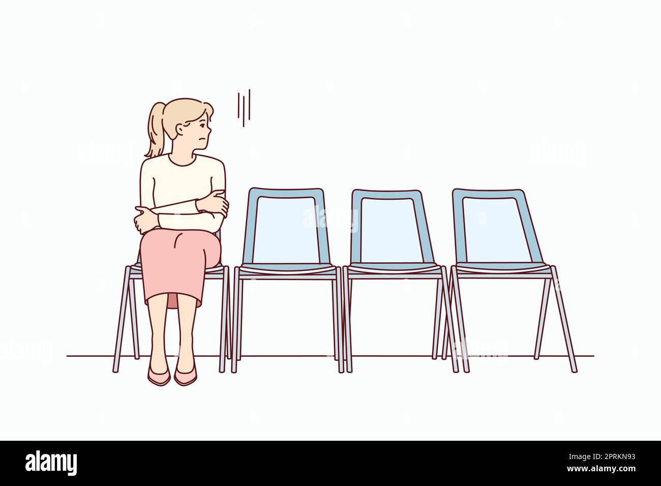 Anxious young woman sit on chair in corridor waiting or appointment ...