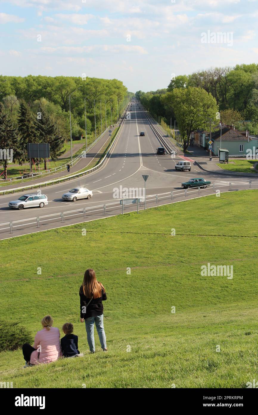 Panorama of motorway with cars and green trees on sides of road. High ...