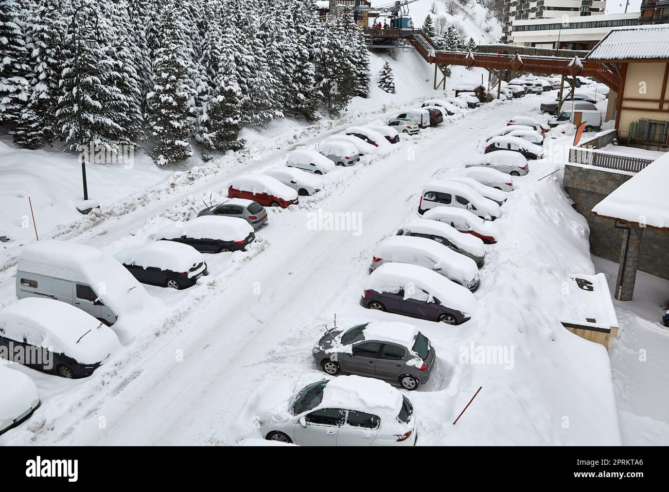 Parking cars covered with fresh snow in winter Stock Photo - Alamy