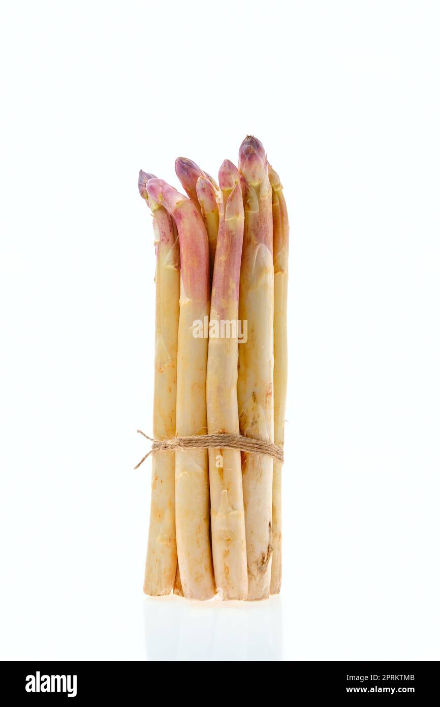 Bunch of asparagus stalks isolated on white background Stock Photo - Alamy