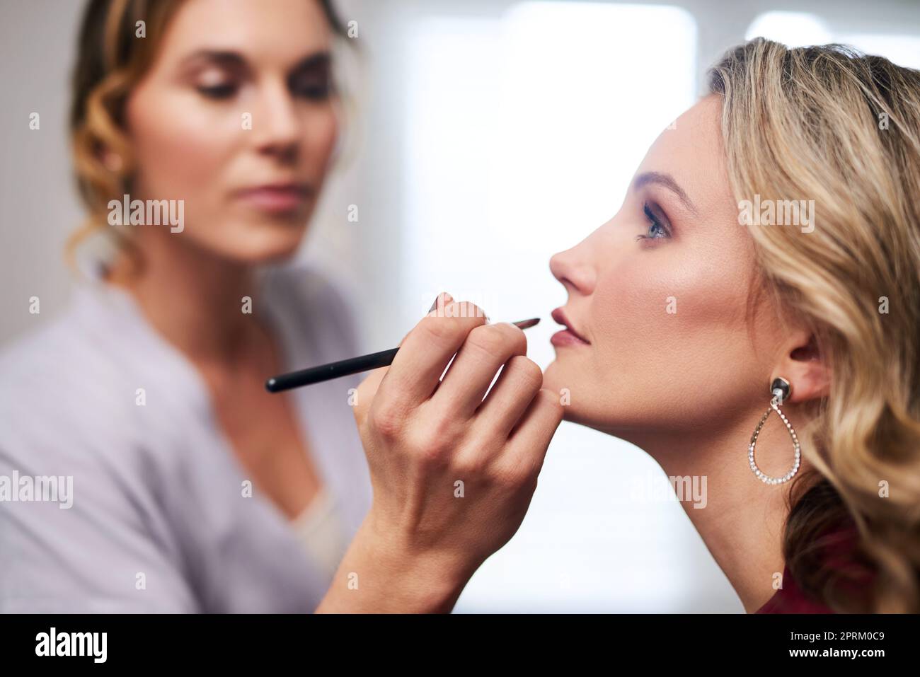 Having makeup done hi-res stock photography and images - Alamy