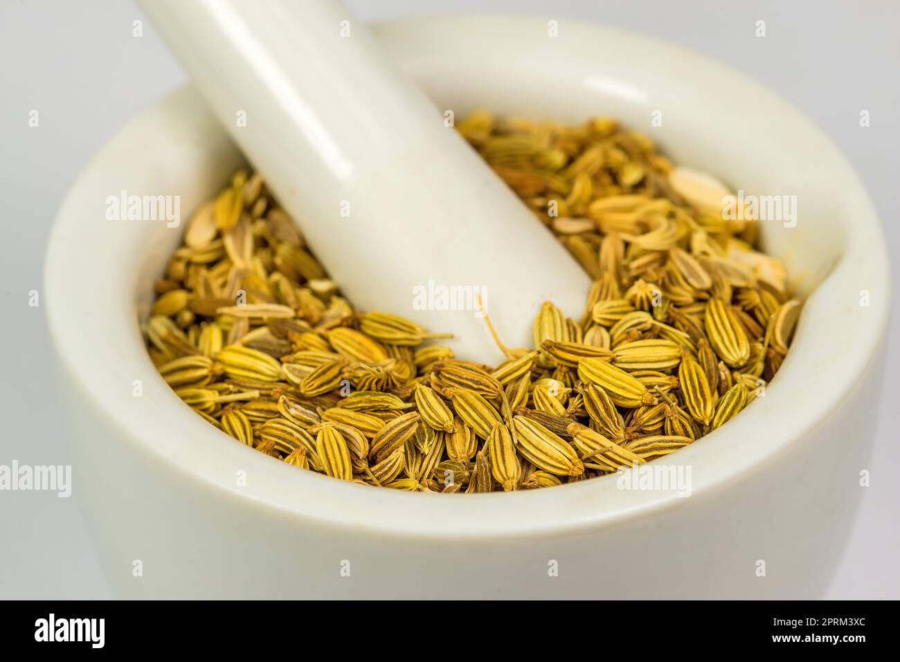 Fennel seeds, medicinal drug and spice in a mortar Stock Photo - Alamy