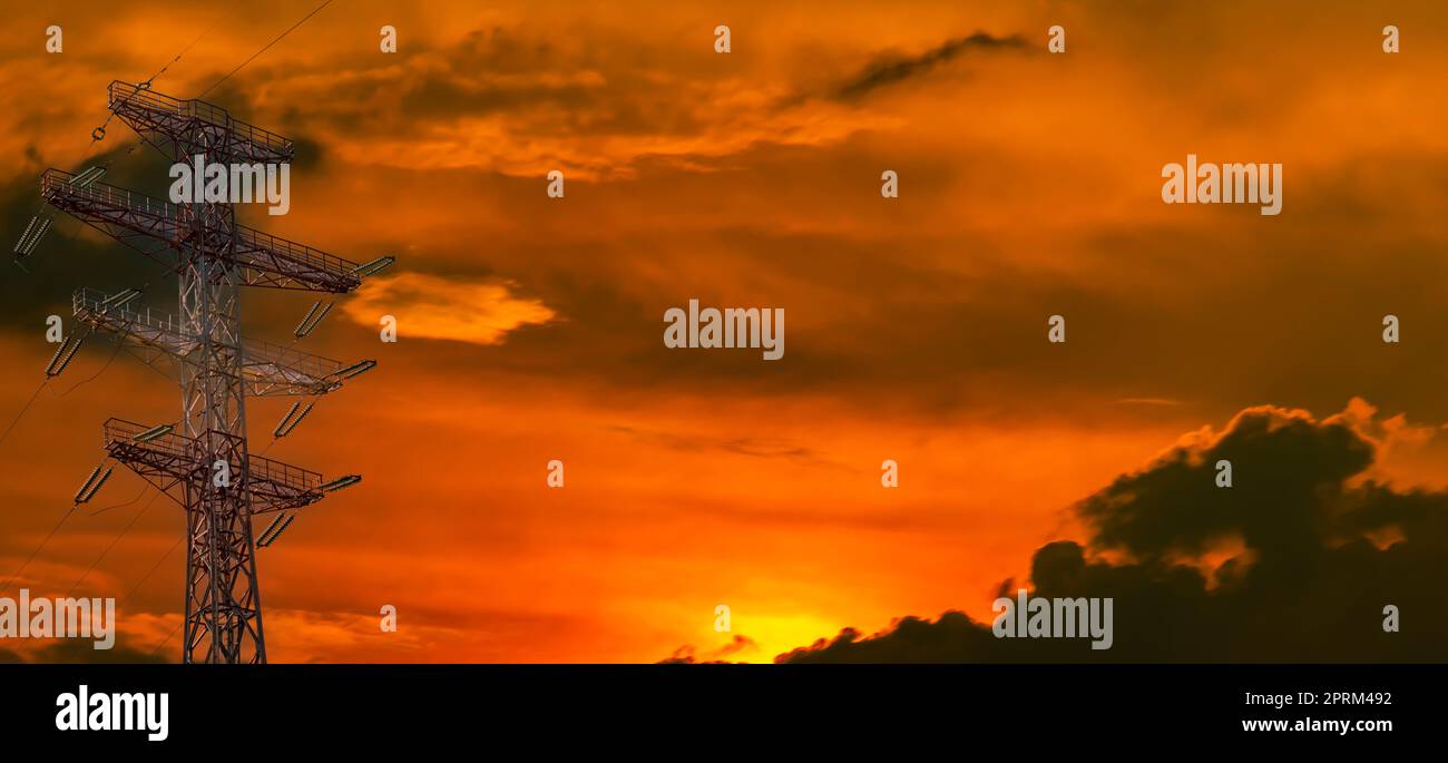 High-voltage tower with electric wires in the rays of sunset. High ...