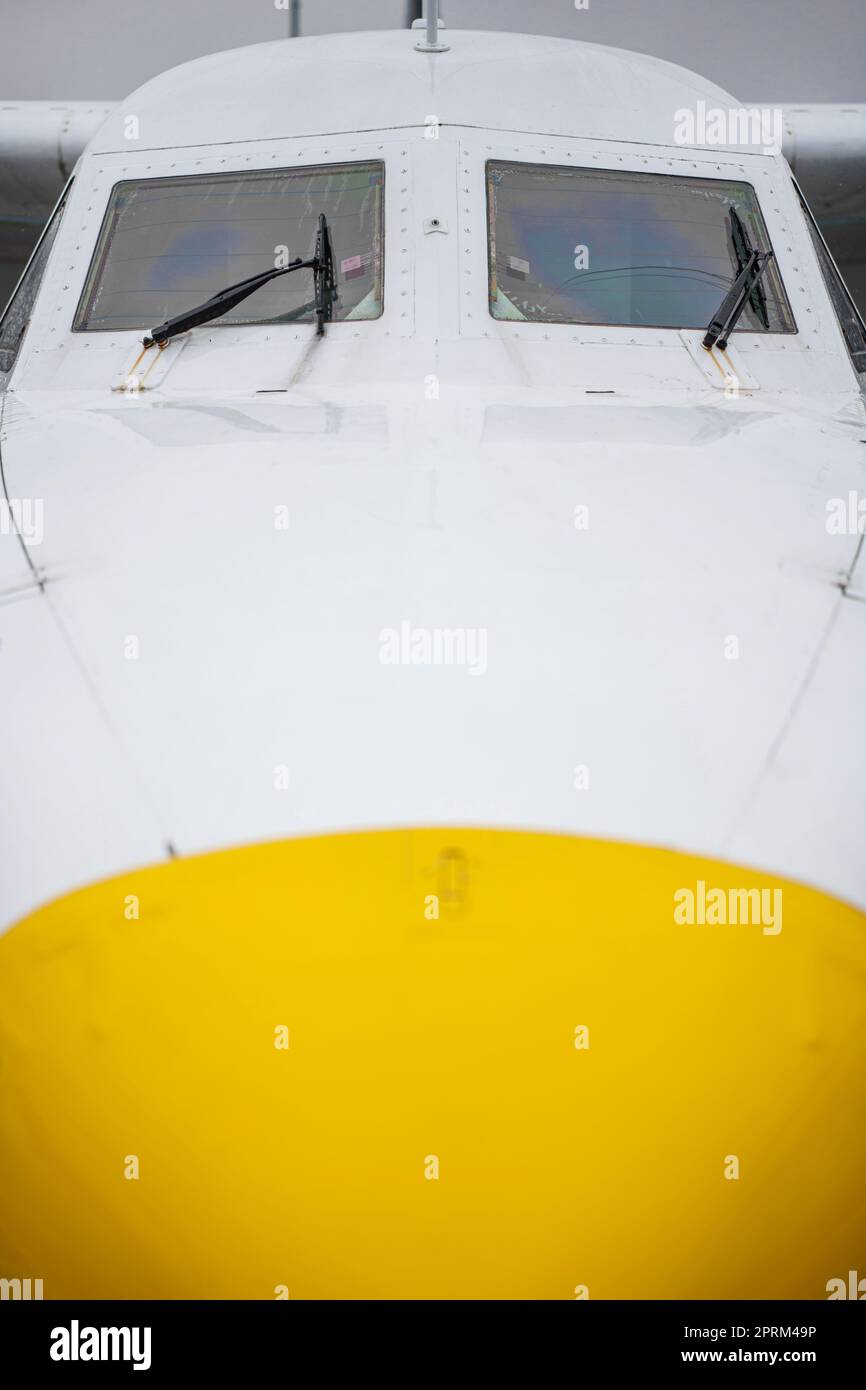 Close front outside view of a white jet plane cockpit Stock Photo - Alamy