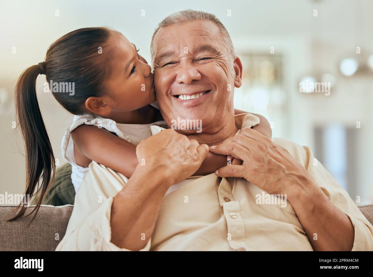 Child kiss grandfather hi-res stock photography and images - Alamy