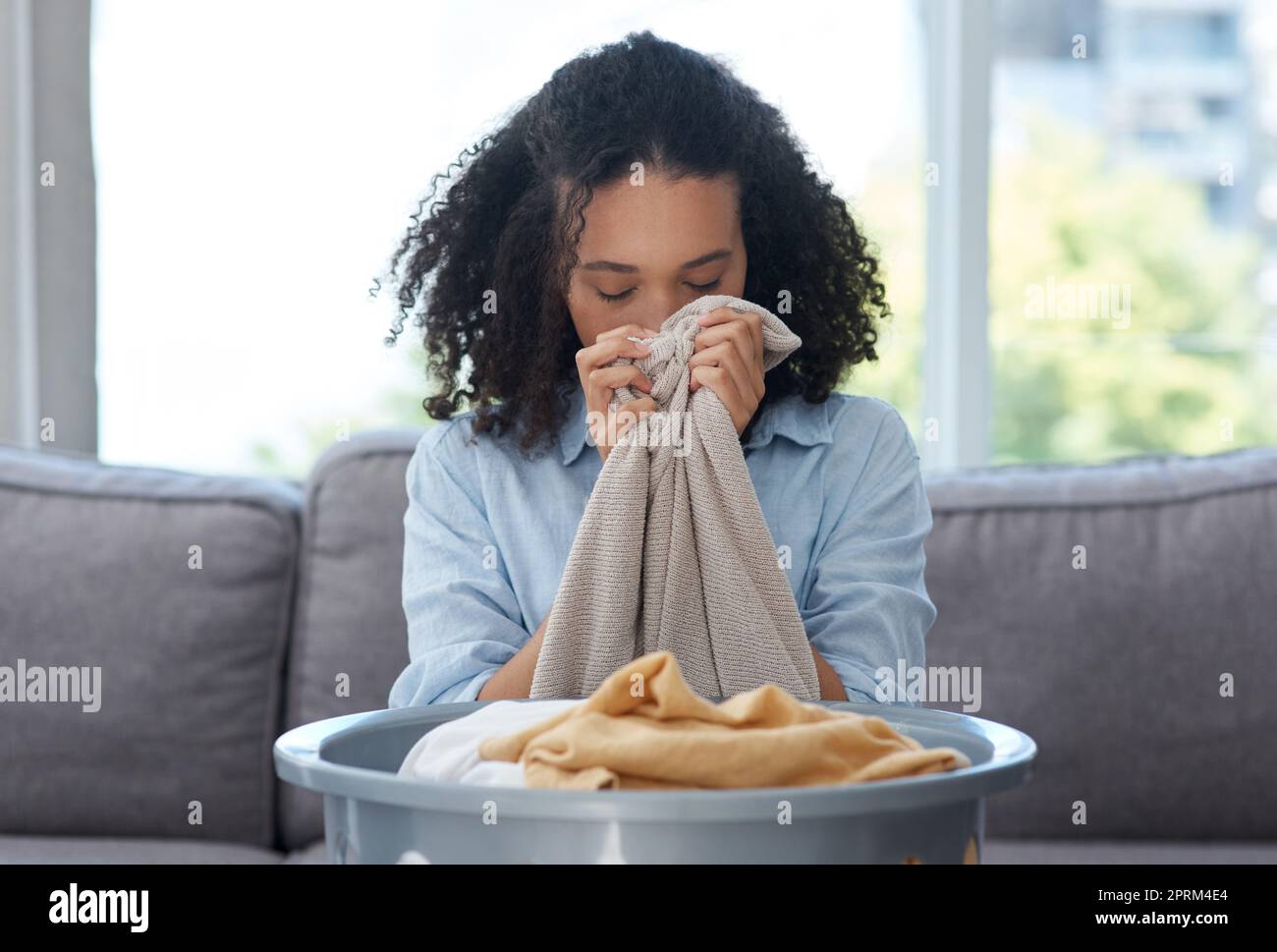 Female smelling fabric hi-res stock photography and images - Alamy