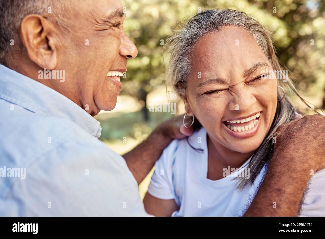 Love, park and senior couple laugh, have fun and enjoy bonding quality ...