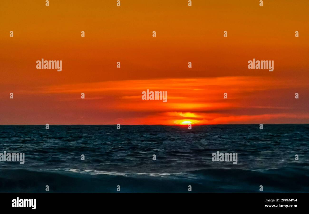 Beautiful stunning colorful and golden sunset in yellow orange red on ...