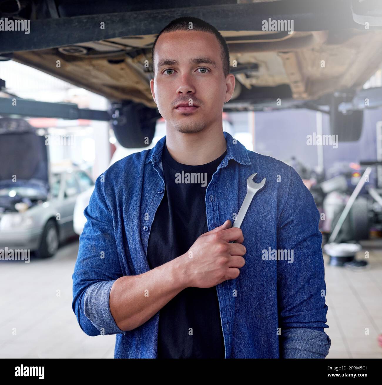 Man, mechanic and tool in engineering for auto repairs, handyman or ...