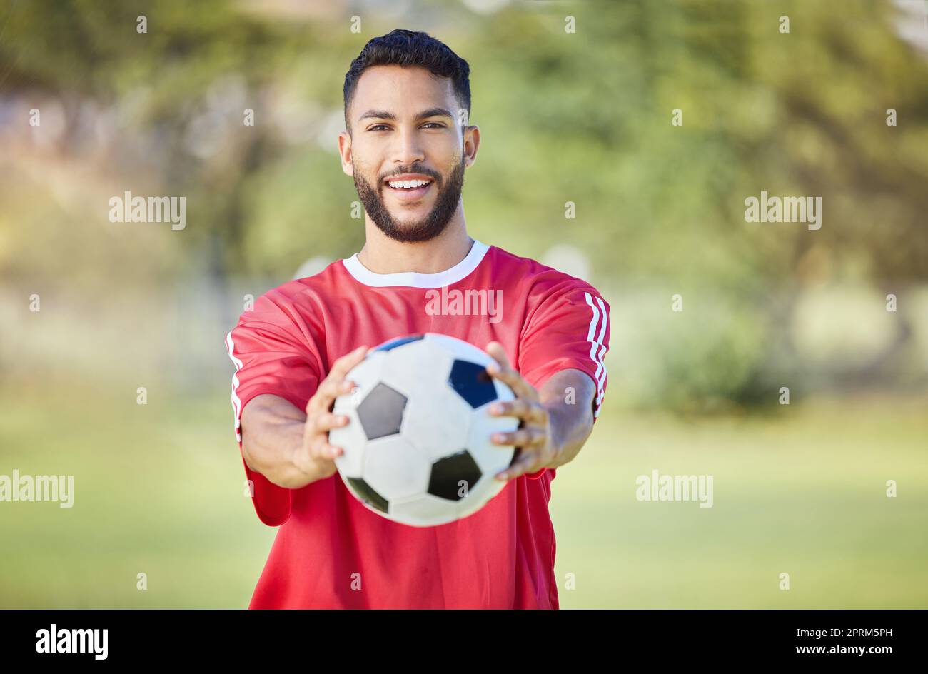 Soccer player, soccerball and sports man with ball after training ...