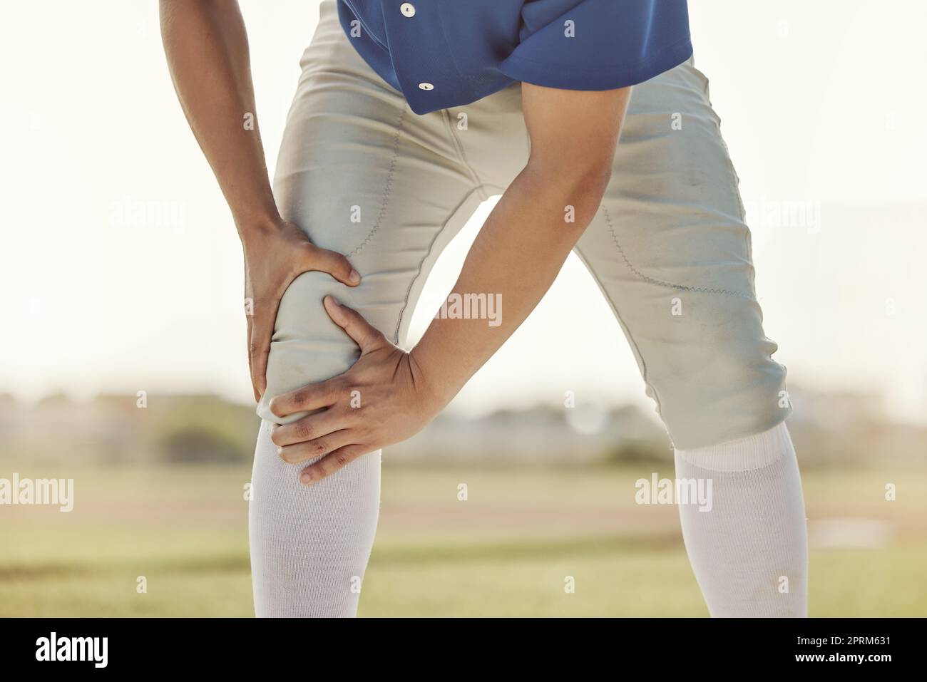 Sports man, knee injury and athlete with leg muscle strain on baseball ...