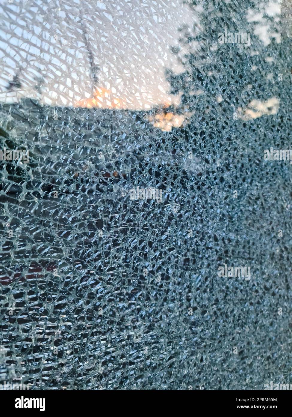 Broken glass with many shards after a burglary in close-up Stock Photo ...