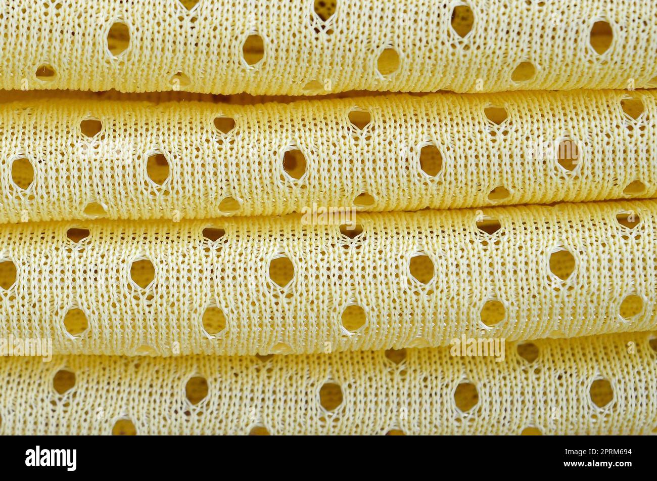 Yellow mesh sport wear fabric textile pattern background. Yellow color ...