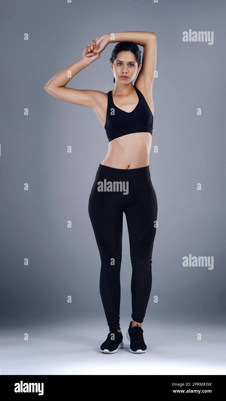 Perfect poise and posture. Full length shot of a sporty young woman ...