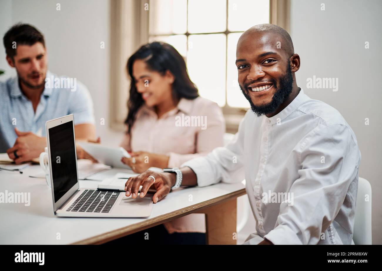Creativity flourishes with our kind of collaborations. Portrait of a young businessman having a ...