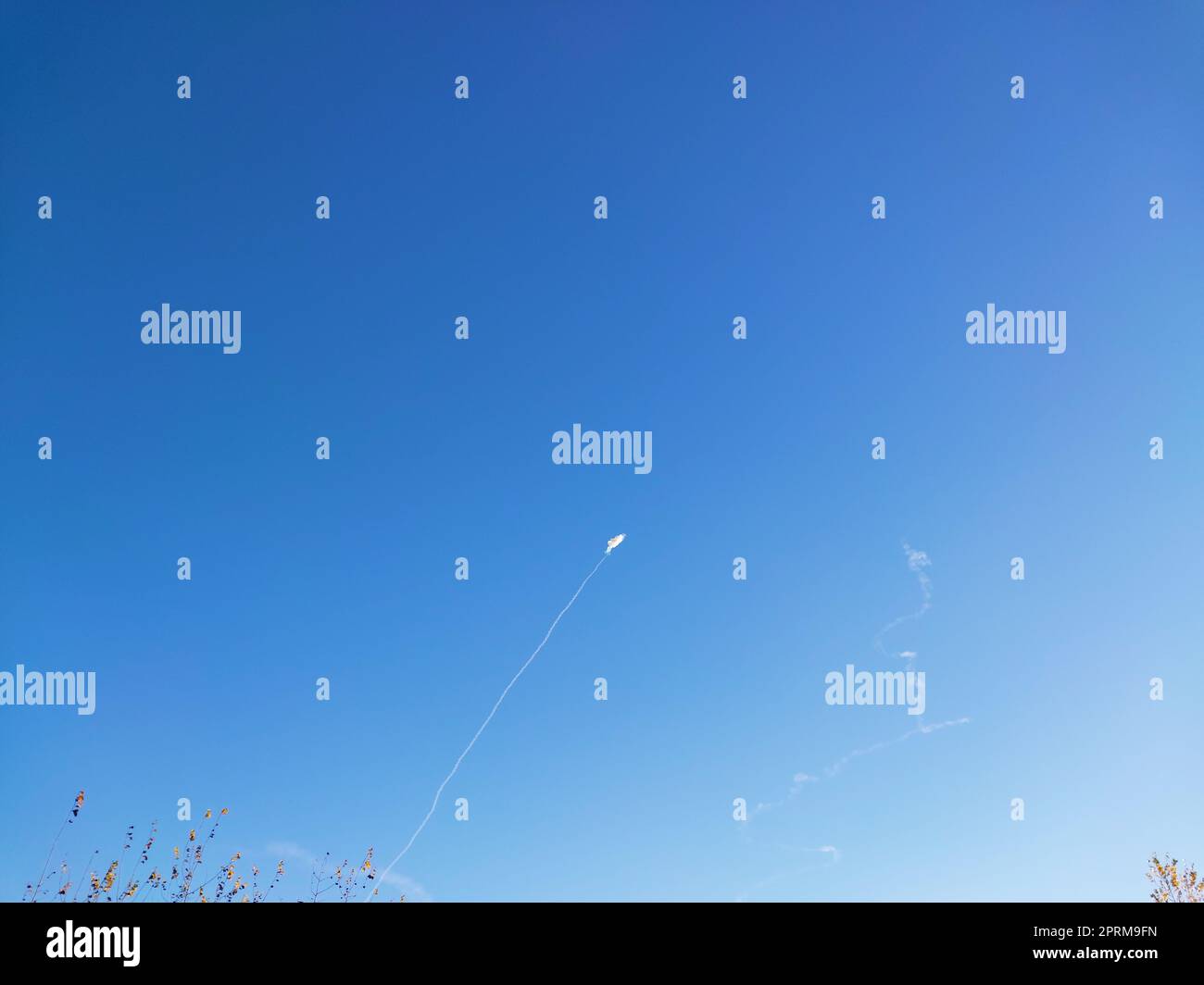 Explosions of rockets and air defense in a the sky Stock Photo - Alamy