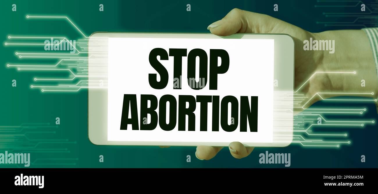 Hand writing sign Stop Abortion, Business idea prevent the uncontrolled ...