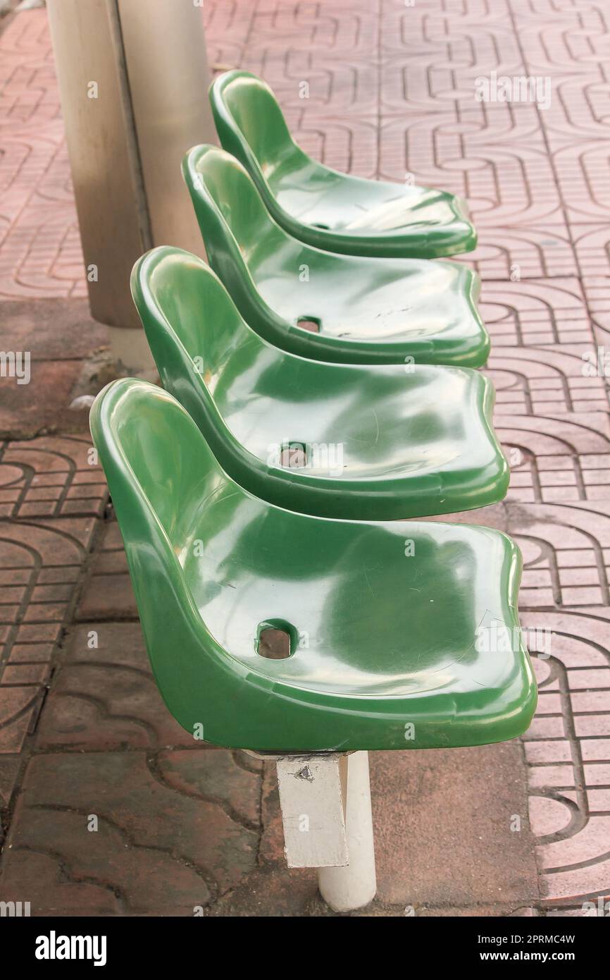 Green plastic chair at the bus stop For passengers waiting Stock Photo ...