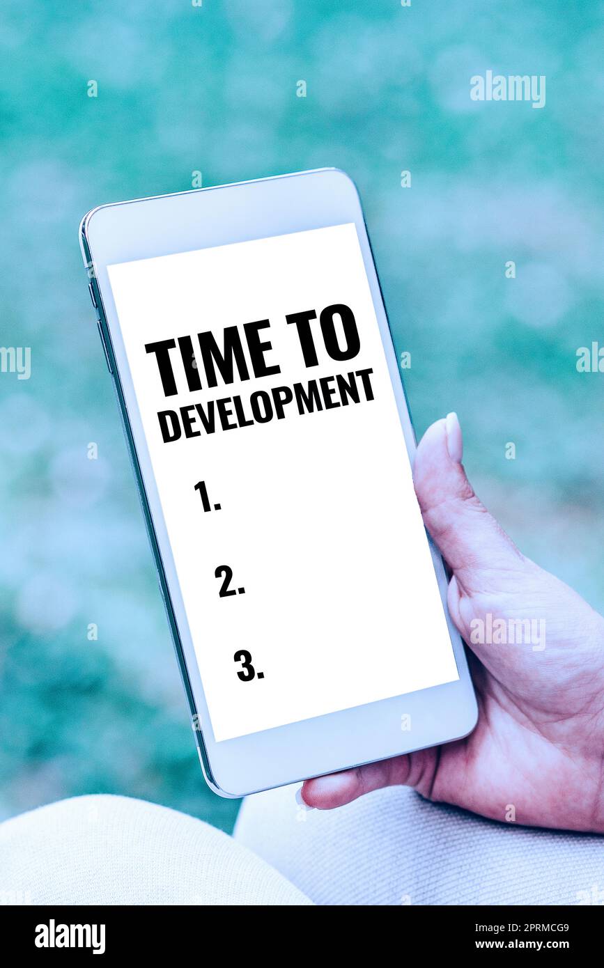 Hand writing sign Time To Development, Word for Business StartUp ...