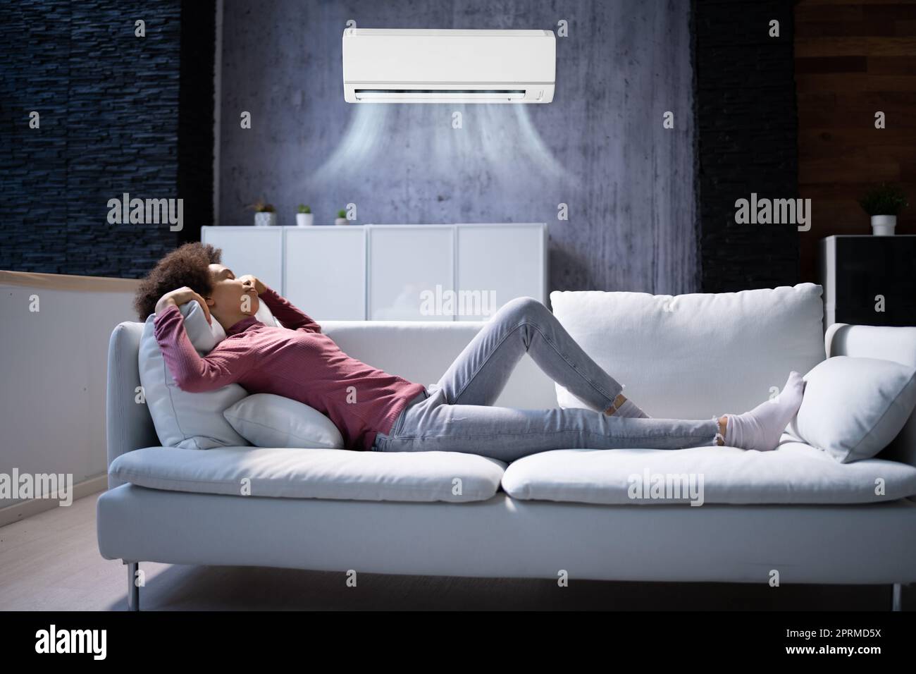 Air Conditioner In Living Room At Home. Cool Ac Tech Stock Photo - Alamy