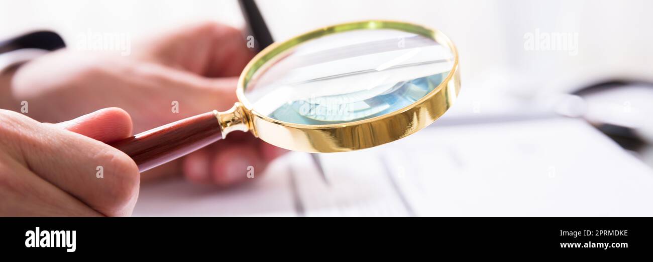 Checking Corporate Fraud Using Magnifying Glass. Business Expense Stock ...