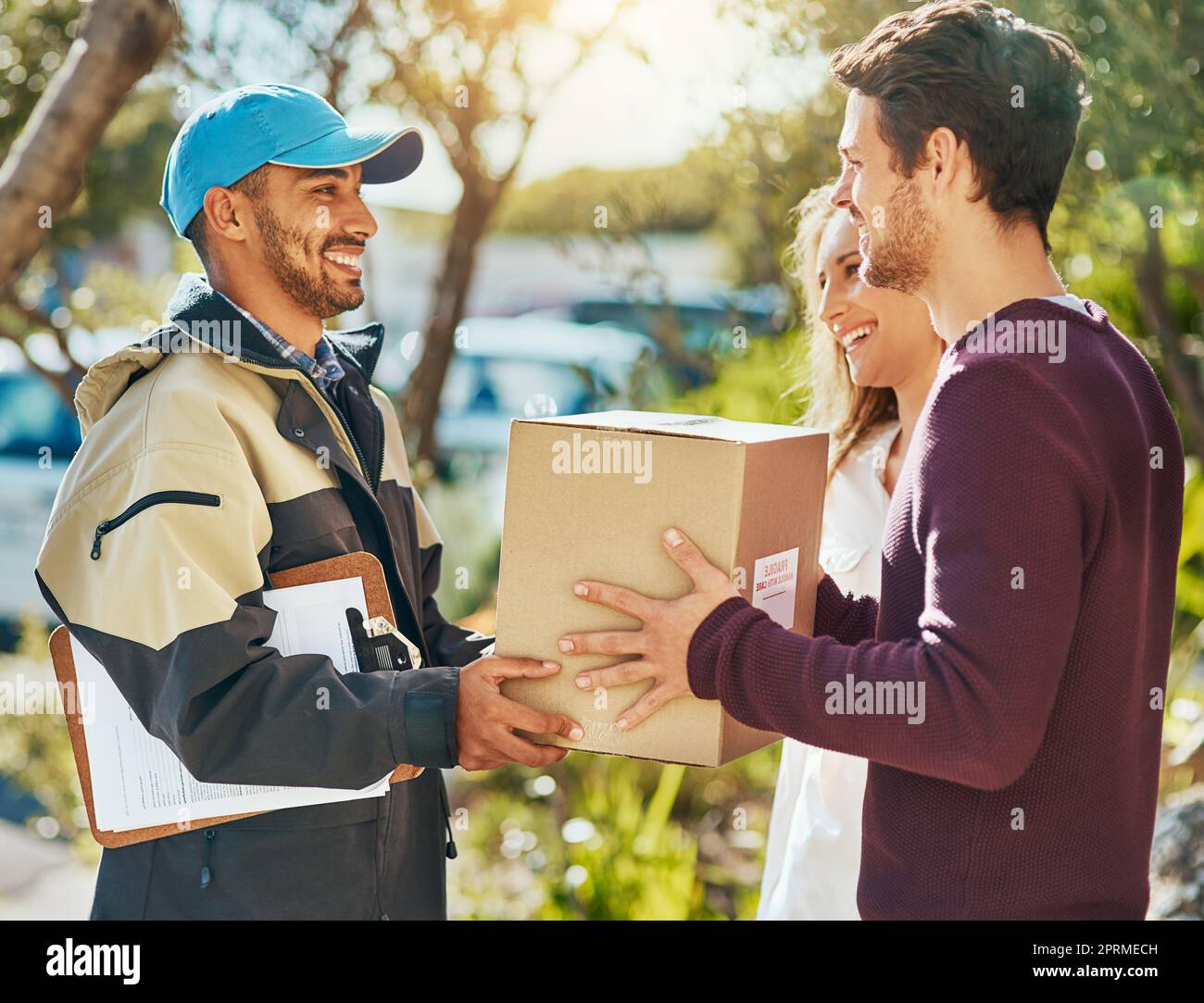 Hand over package hi-res stock photography and images - Alamy