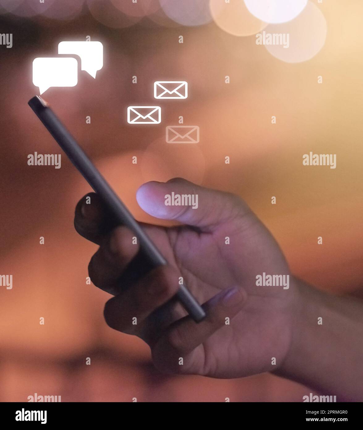 Instant messaging. an unrecognizable mans hand using a cellphone Stock ...