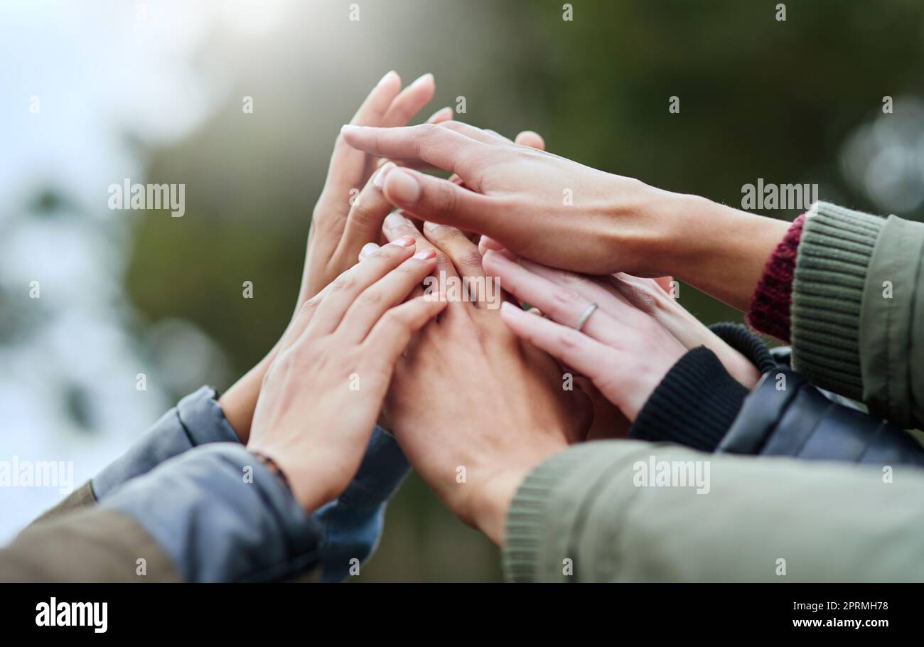 Hands reaching together hi-res stock photography and images - Alamy