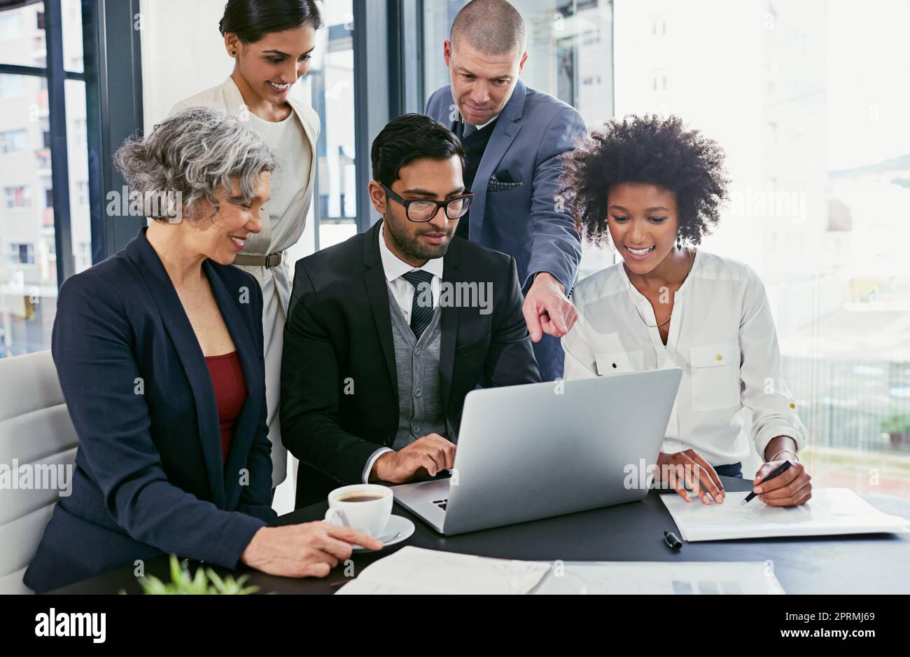 Together we achieve everything faster. a group of businesspeople coming ...