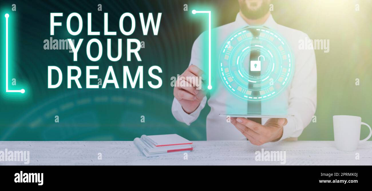 Sign displaying Follow Your Dreams, Word Written on motivational and ...