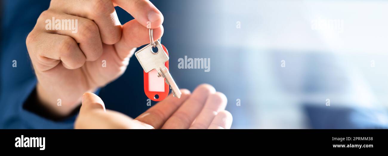 Estate Agent Giving House Keys Stock Photo - Alamy