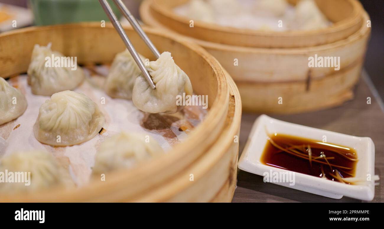 Chinese style steamed soup bun in restaurant Stock Photo - Alamy