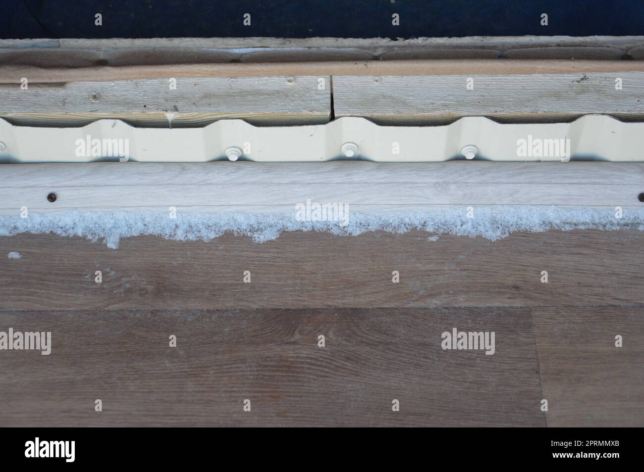 Architectural elements of the building covered with a snow Stock Photo ...