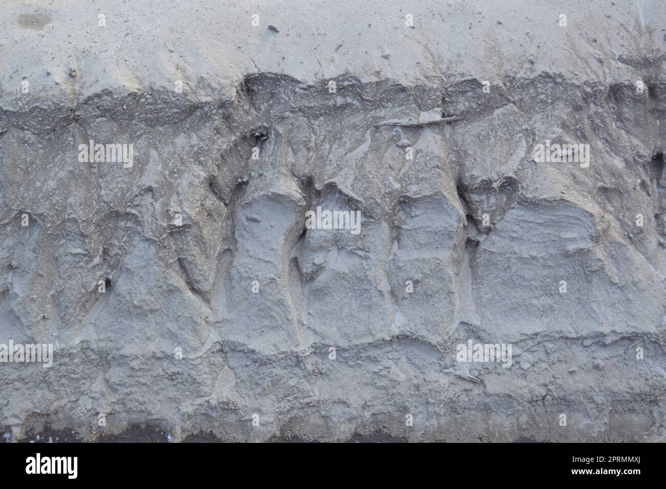 Patterns and textures of frozen ground in the winter Stock Photo - Alamy