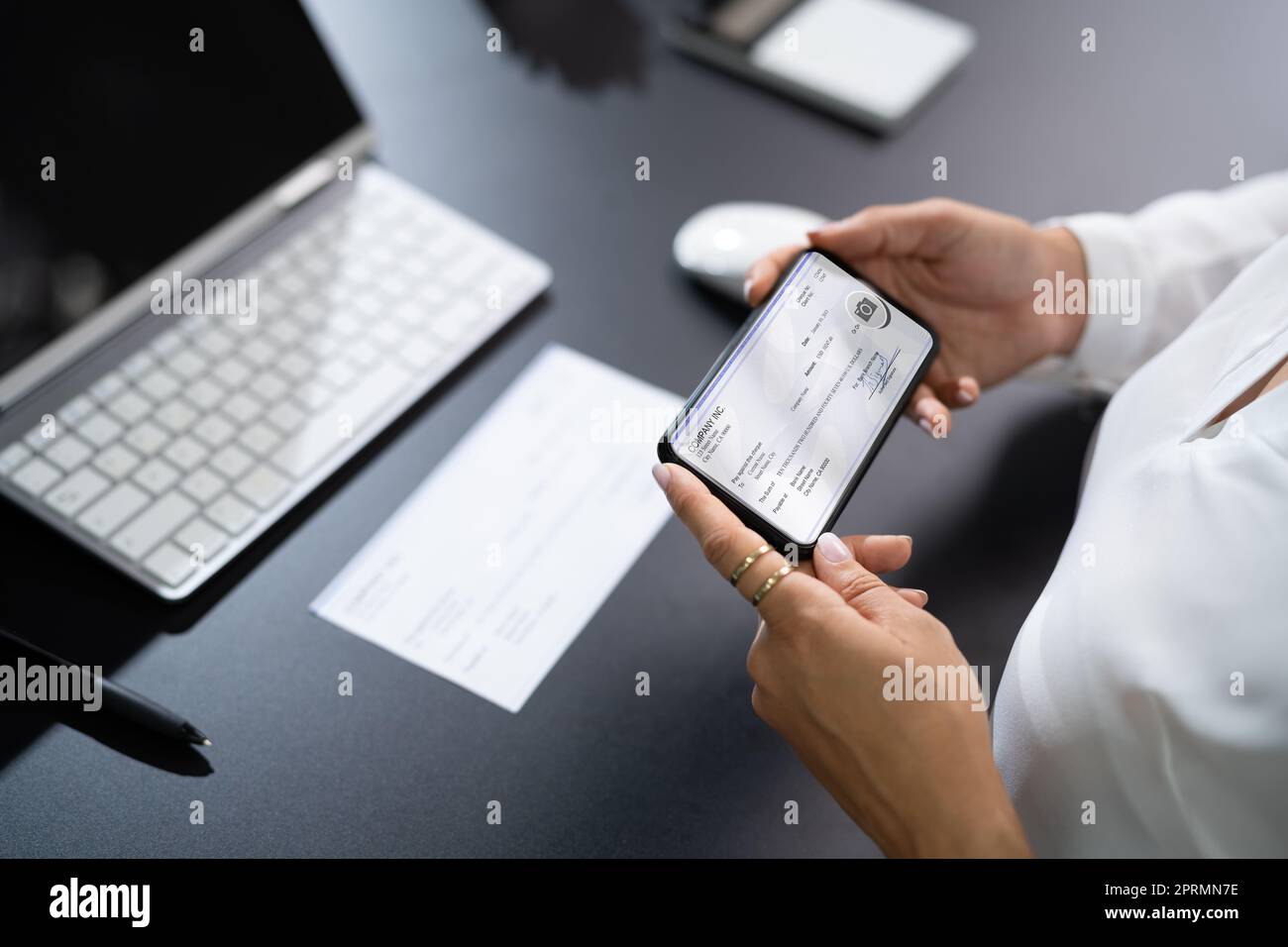 Remote Check Deposit Using Mobile Remote Stock Photo - Alamy