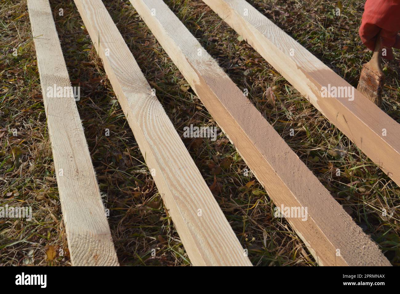 Production of lumber for a wooden structures Stock Photo - Alamy