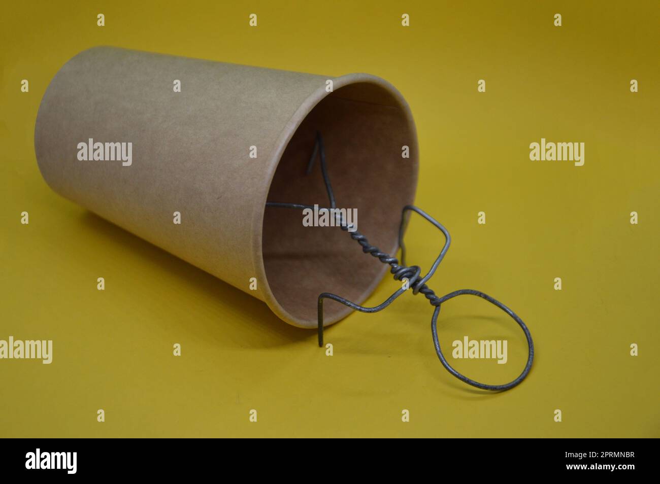 Human figure made of metal wire with an the object Stock Photo - Alamy