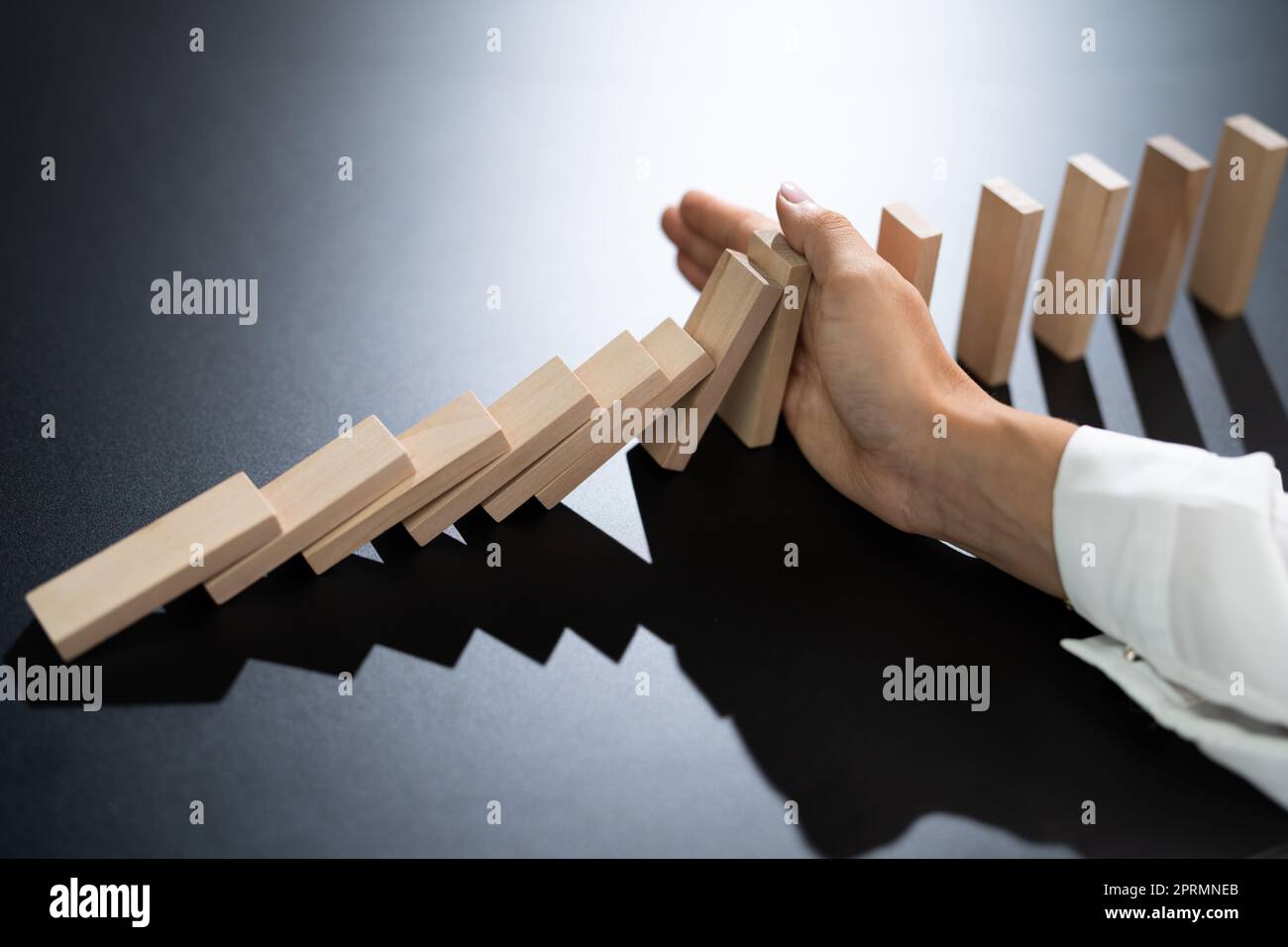 Business Woman Domino Stop Stock Photo - Alamy