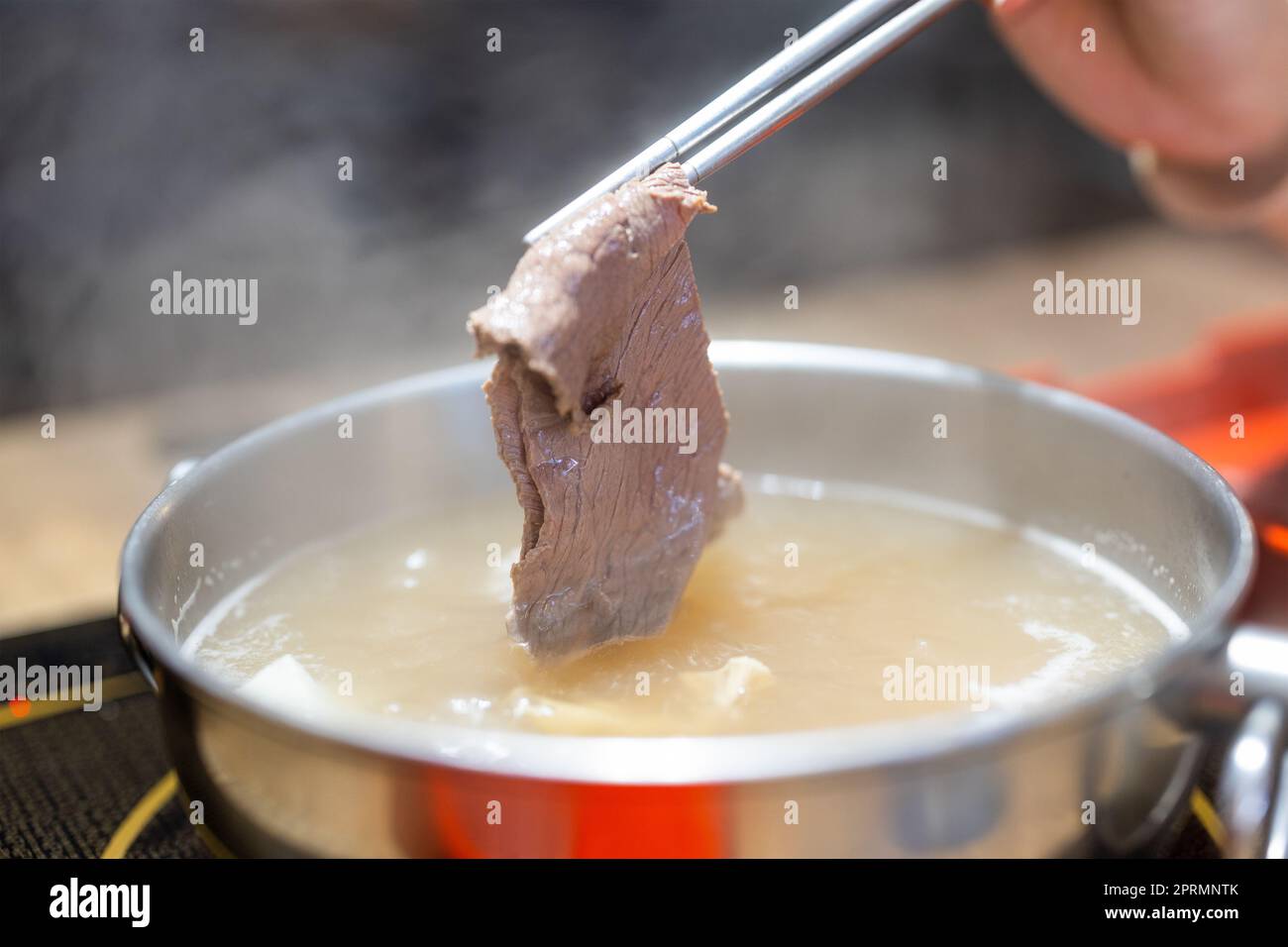 Taiwanese style hot pot with slice of beef Stock Photo - Alamy