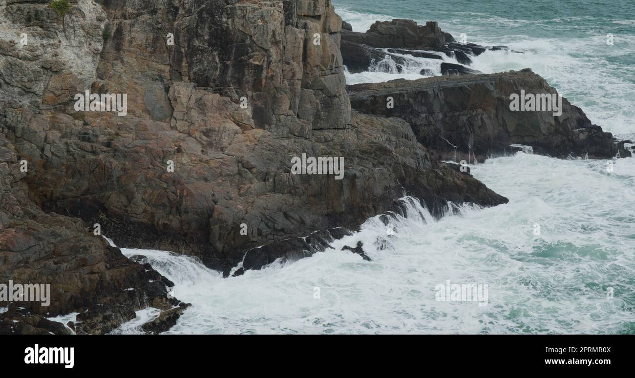 Sea wave splash on the rock Stock Photo - Alamy