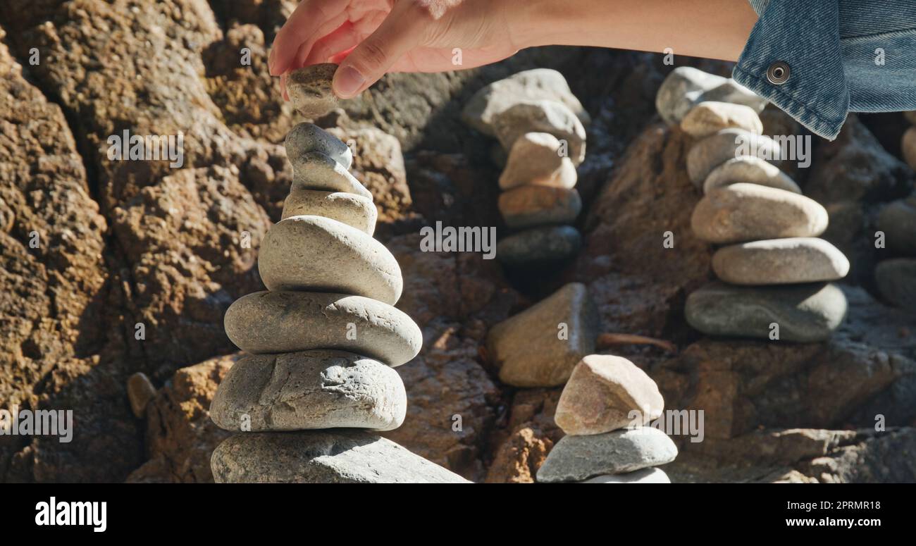 Balanced Pebble stone at beach Stock Photo - Alamy