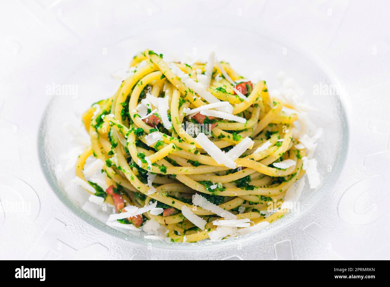 spaghetti with bacon, parsley and parmesan cheese Stock Photo - Alamy