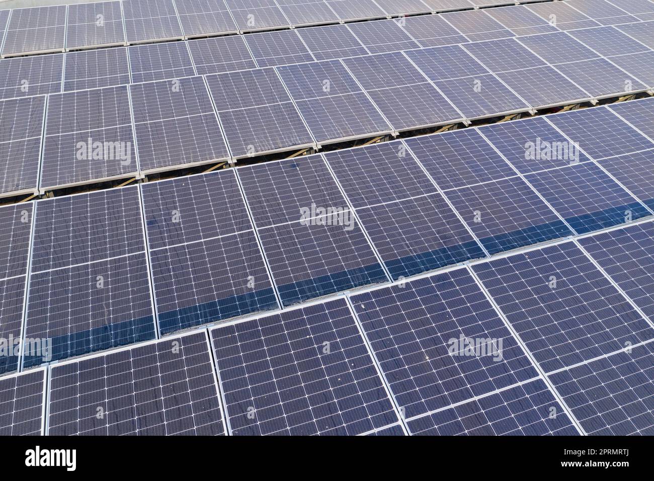 Drone fly over solar panel Stock Photo - Alamy