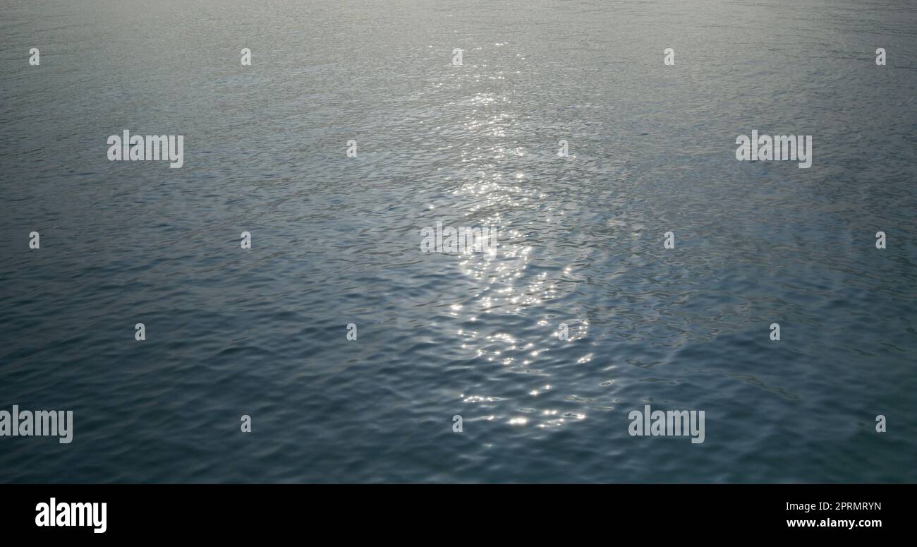 Sea surface water wave pattern with sunlight Stock Photo - Alamy
