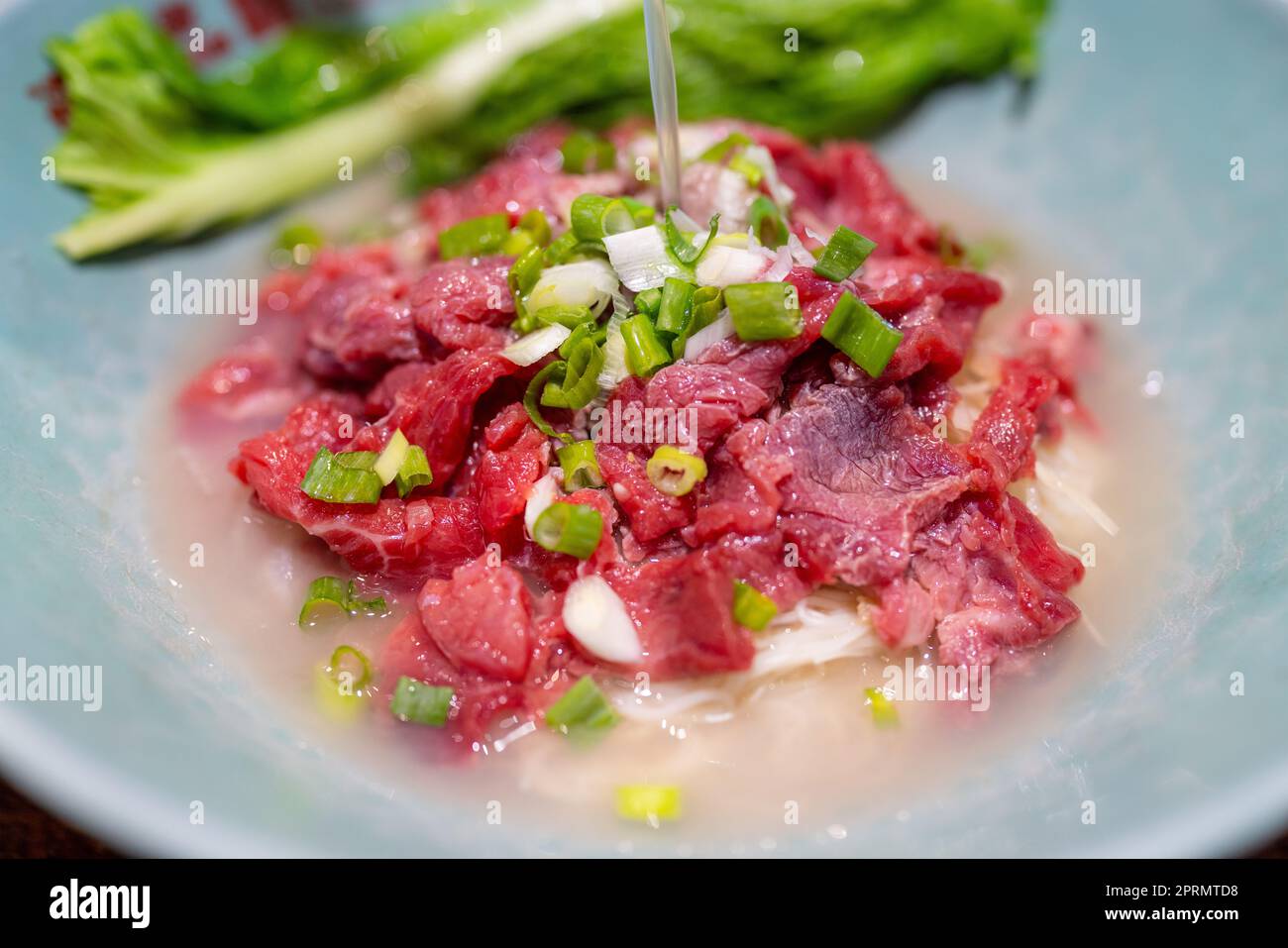 Rice noodle with slice of raw beef, famous cuisine in Kinmen of Taiwan ...