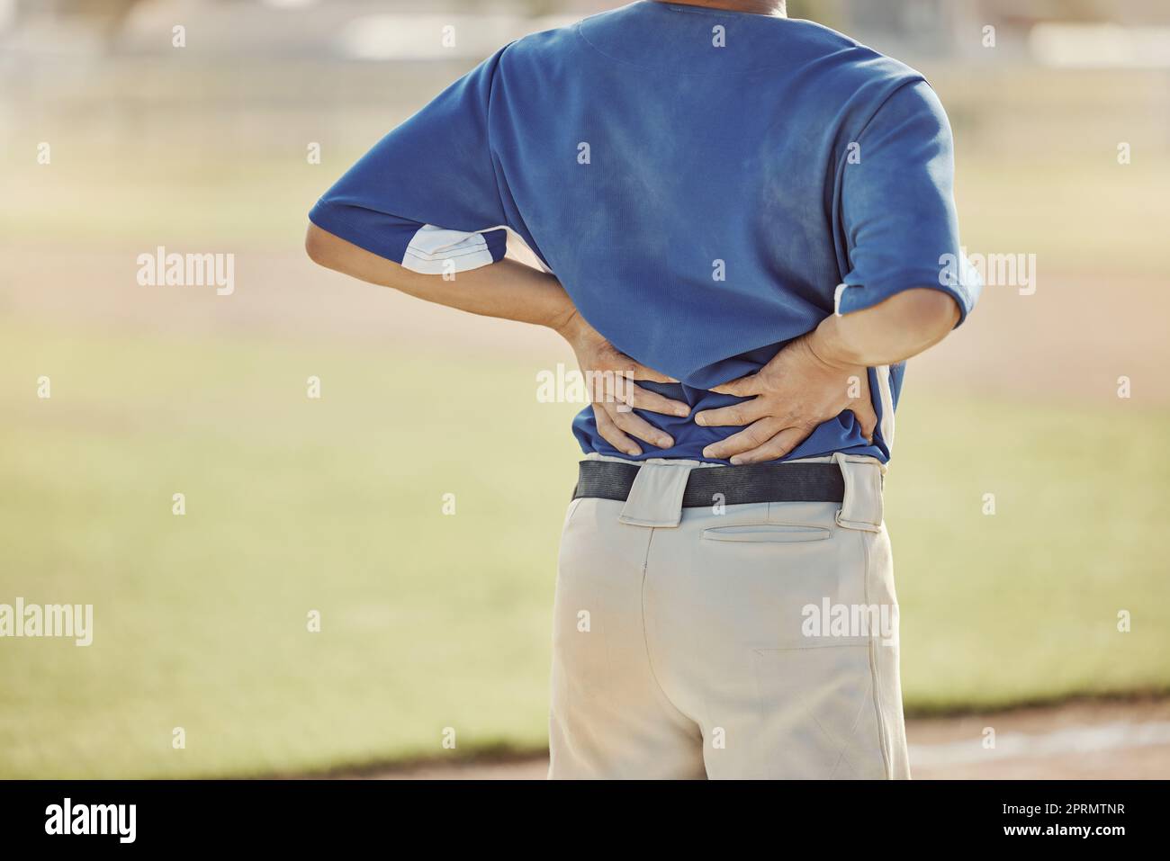 Sports, baseball injury and man with back pain, emergency or muscle ...