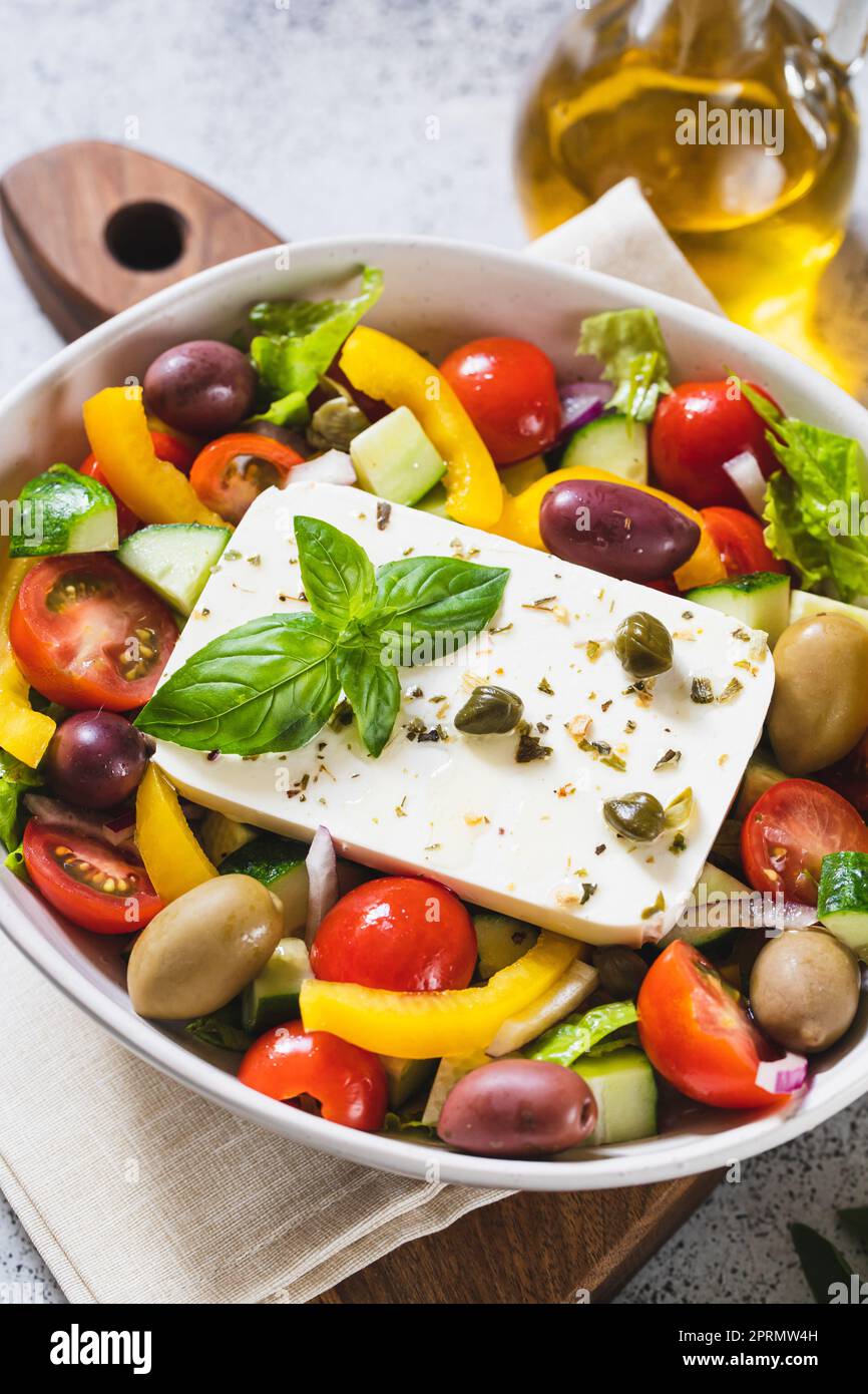 Classic Greek salad of fresh cucumber, tomato, sweet pepper, lettuce ...