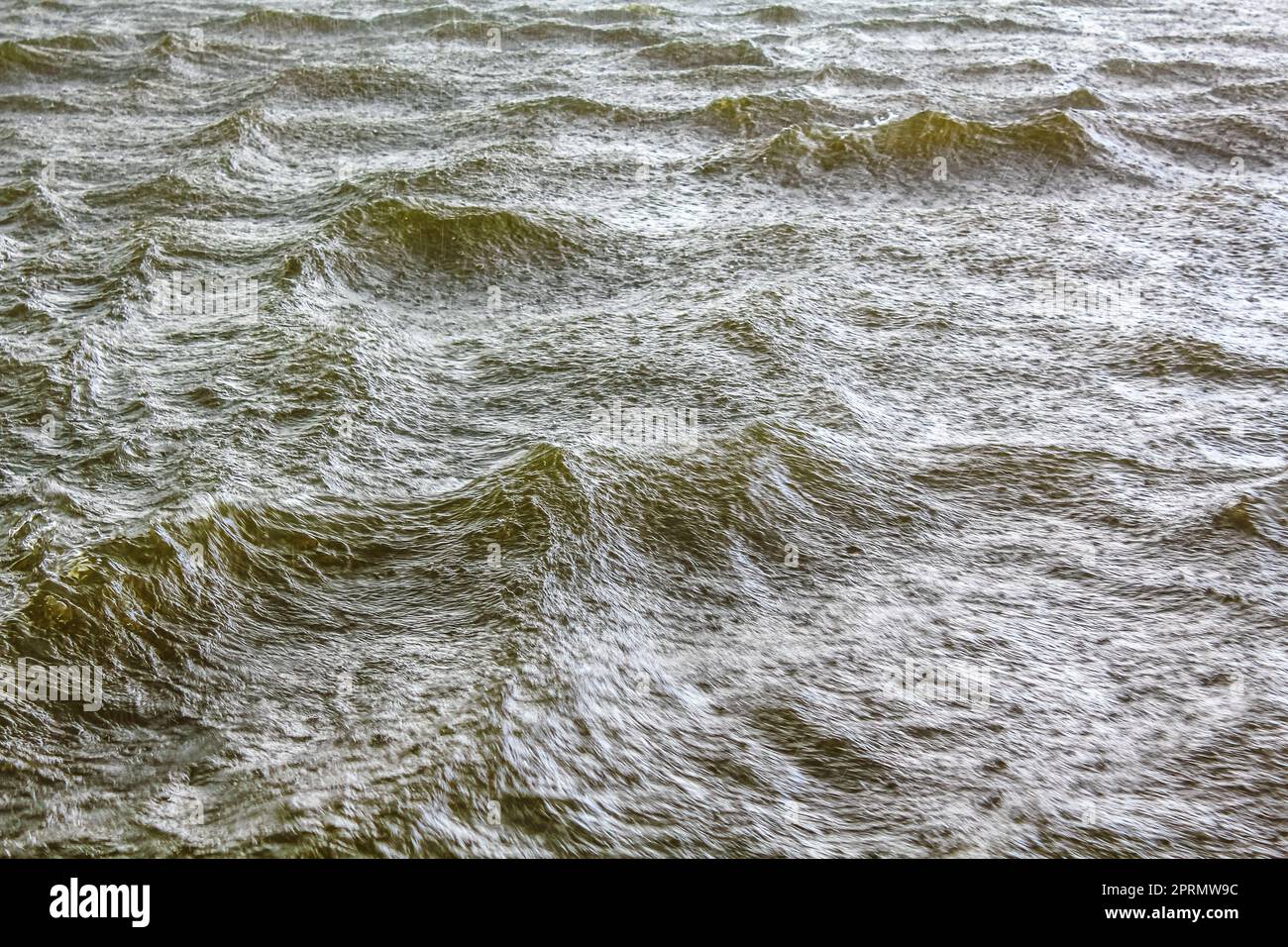 Heavy rain storm and waves water texture Oste river Germany Stock Photo ...
