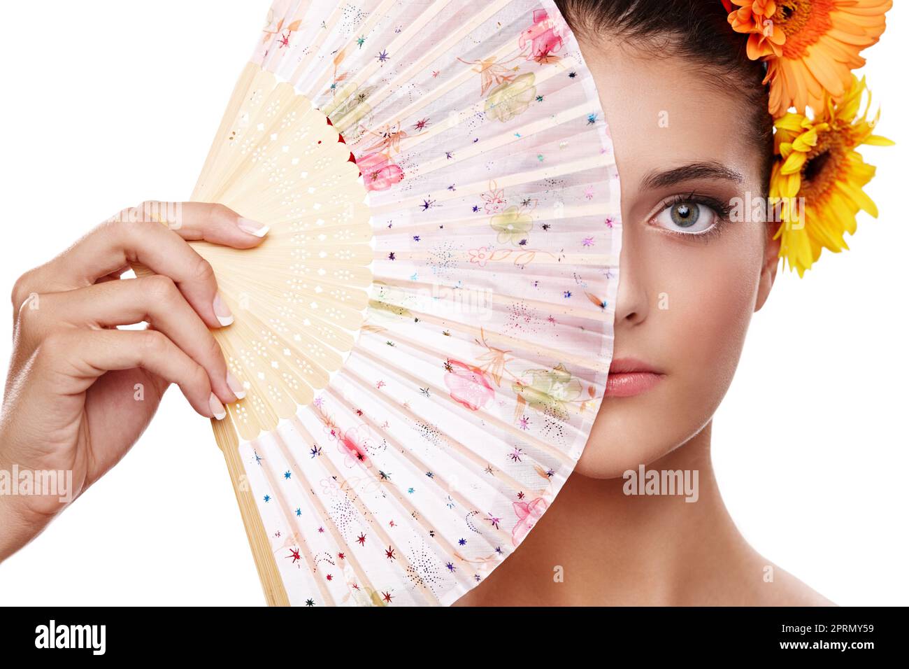 Hiding beauty. Cropped portrait of a beautiful young woman wearing a ... Hiding beauty. Cropped portrait of a beautiful young woman wearing a ...