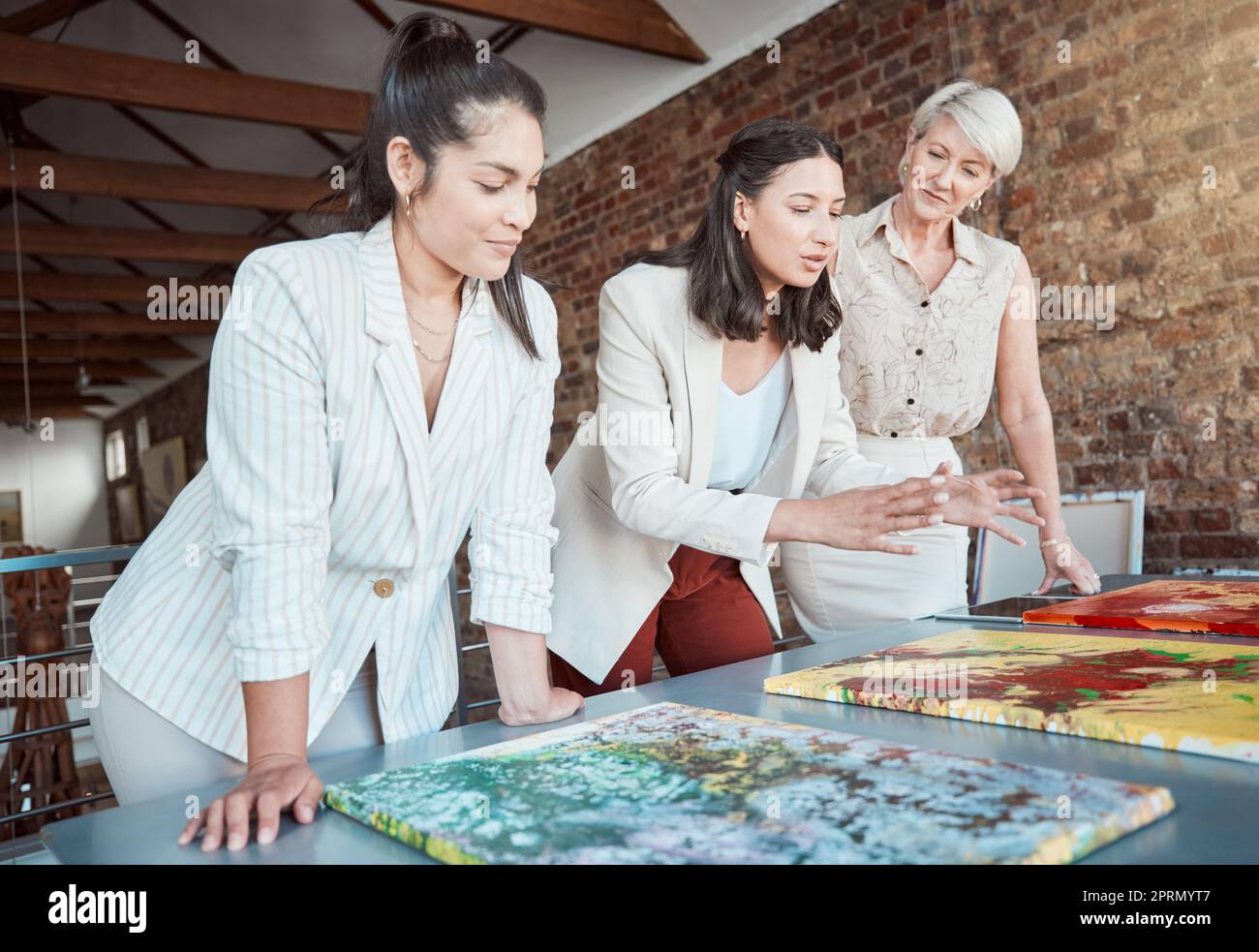 Painting, art and gallery manager planning exhibition with support ...